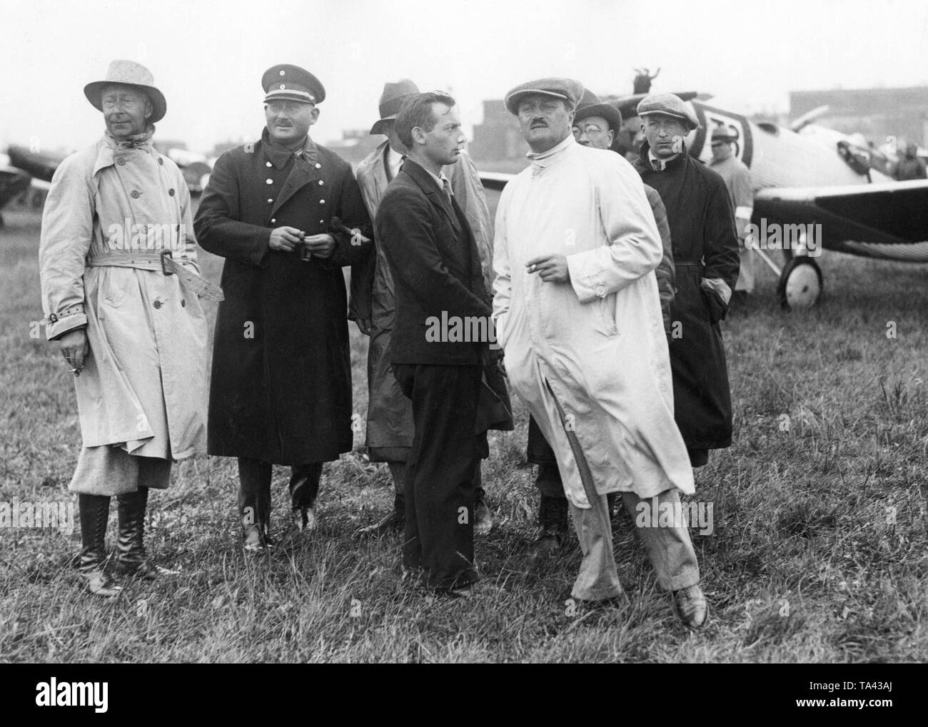 Light on coat Black and White Stock Photos & Images - Alamy