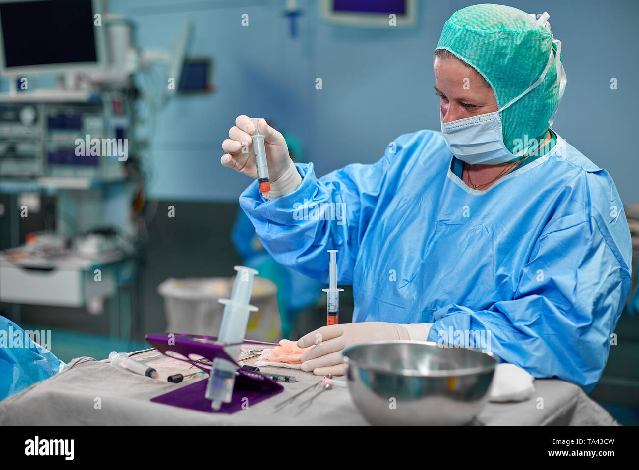 Hands Holding Syringe and Transfer Fat with Nano Fat Transfer Tool in ...