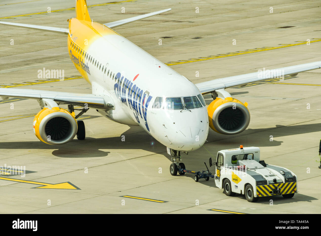 LONDON GATWICK AIRPORT, ENGLAND - APRIL 2019: Embraer 195 plane ...