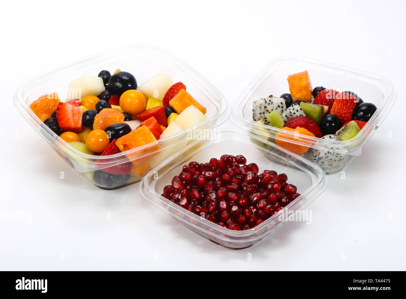 Sliced tropical fruit mix snack in the box Stock Photo - Alamy