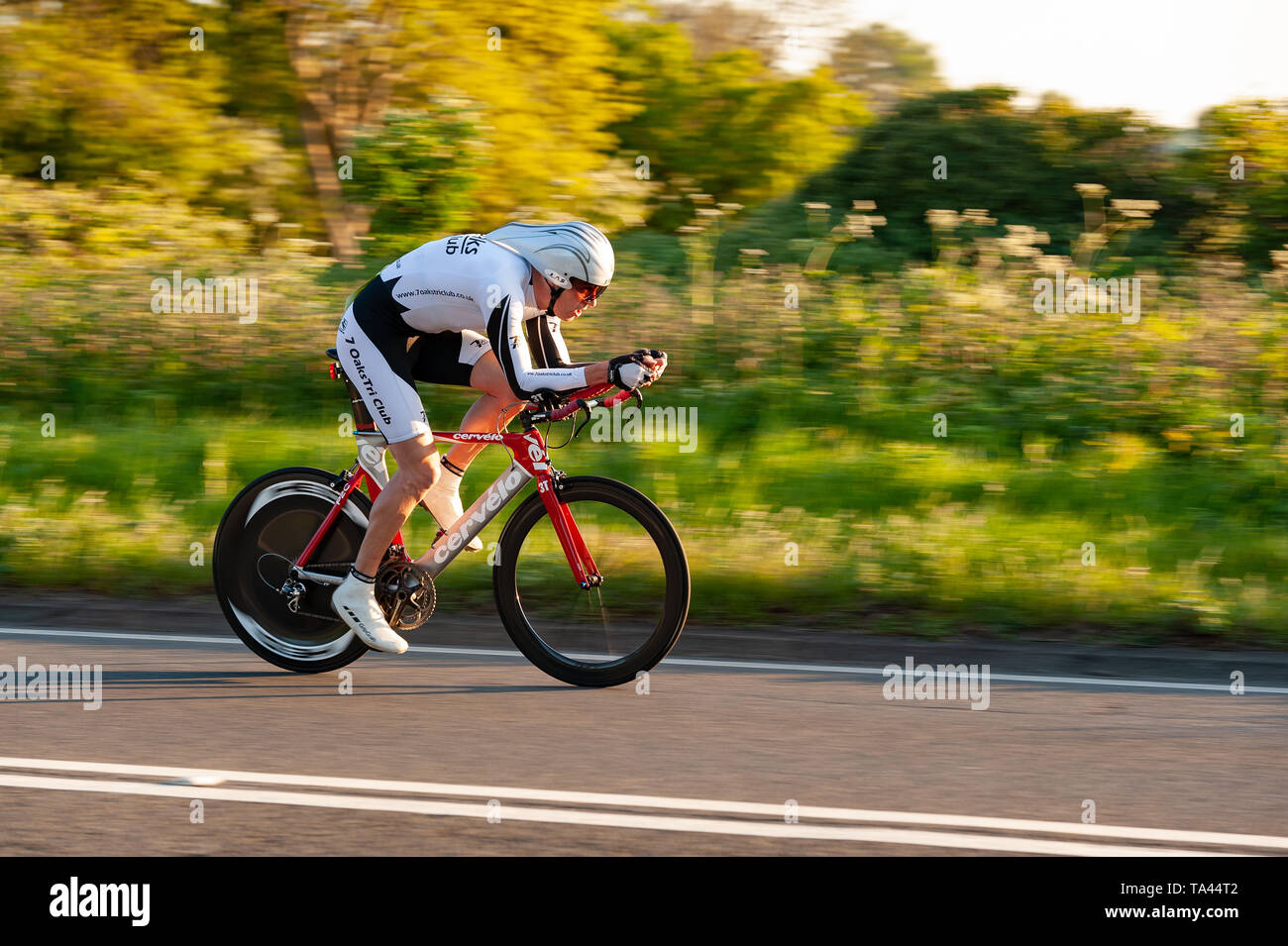 Racing in aero position in TT on time trial club event in summer ...
