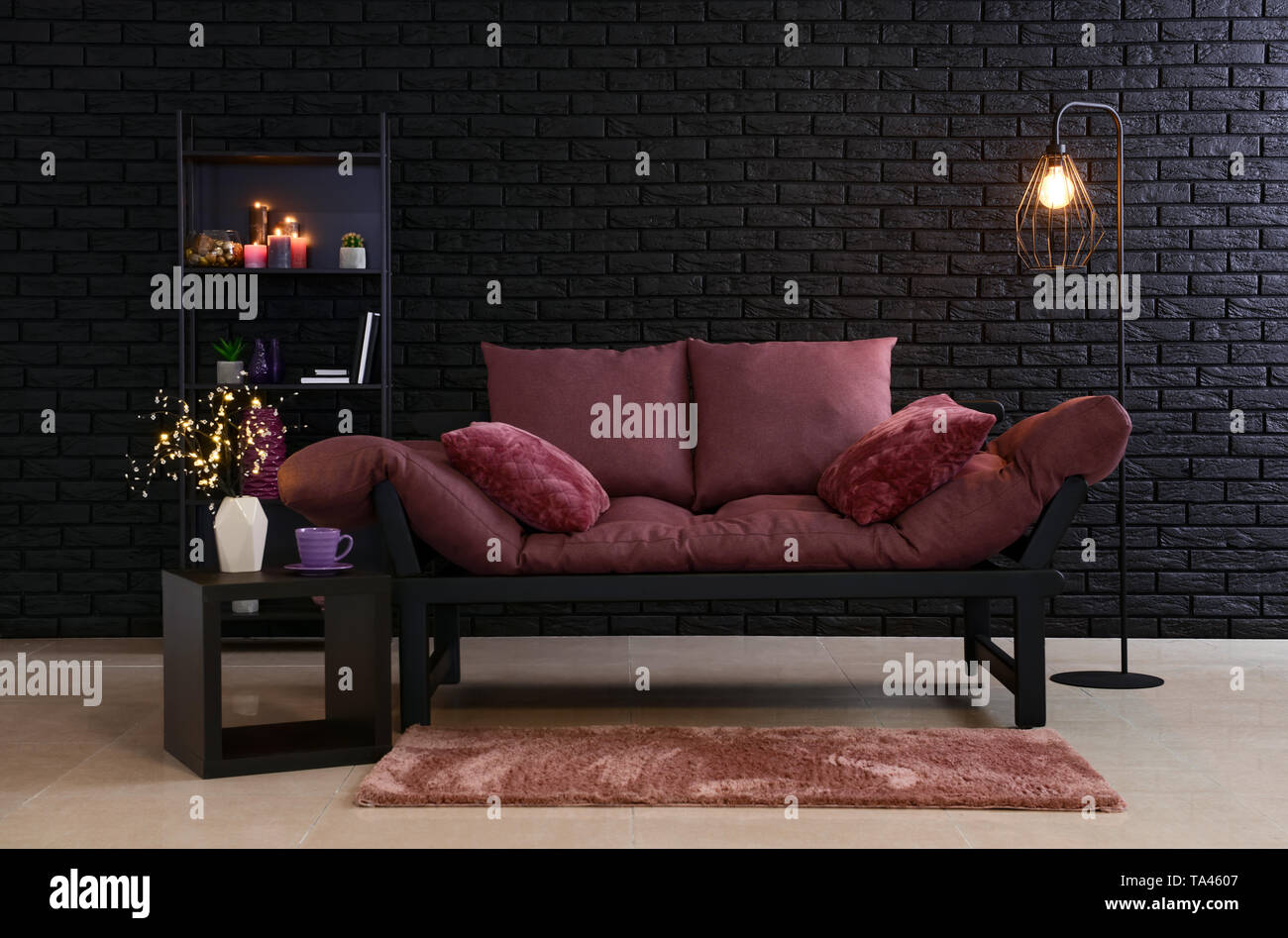 Interior of modern room with comfortable sofa Stock Photo - Alamy