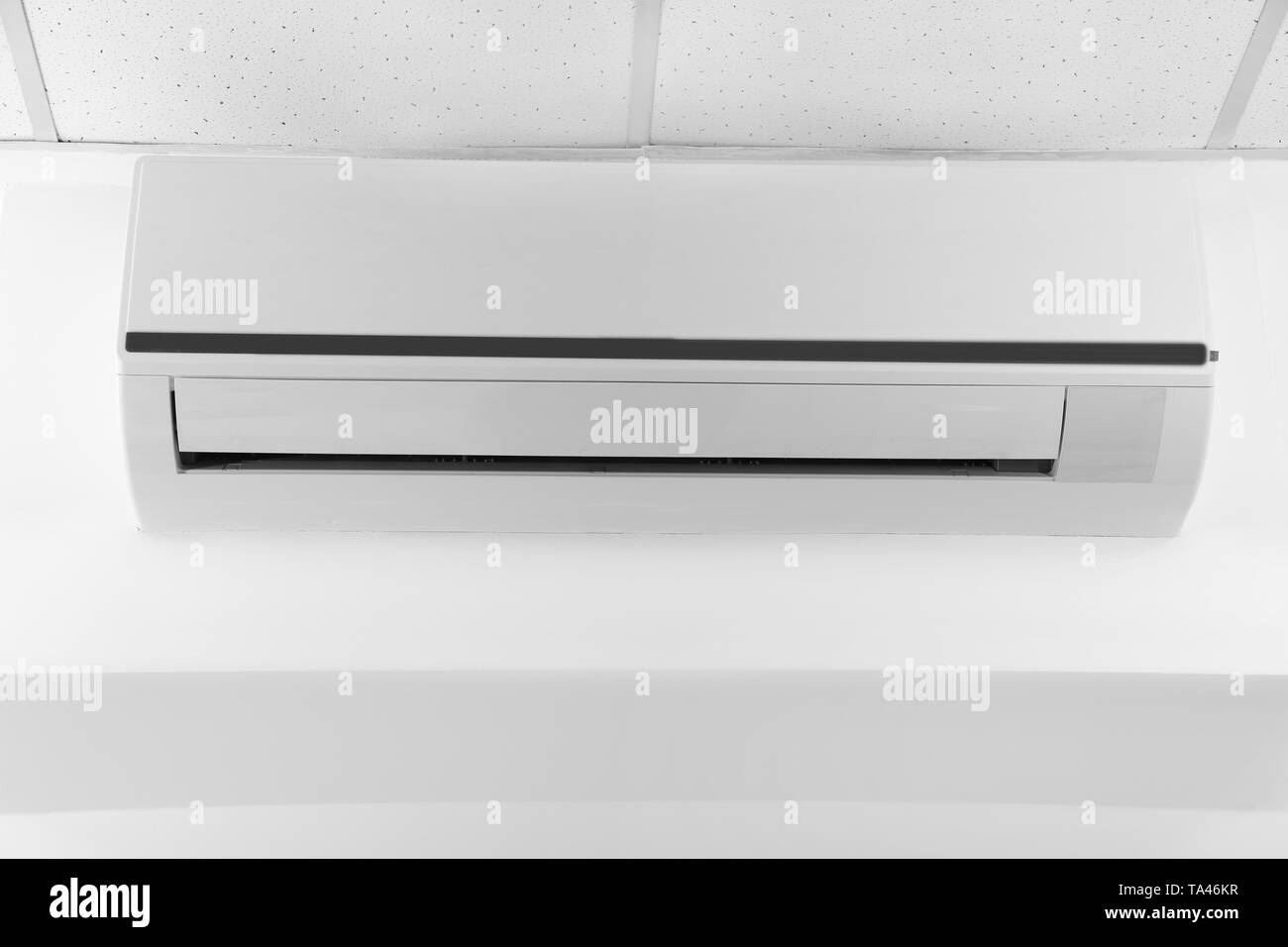 Modern air conditioner on wall Stock Photo - Alamy