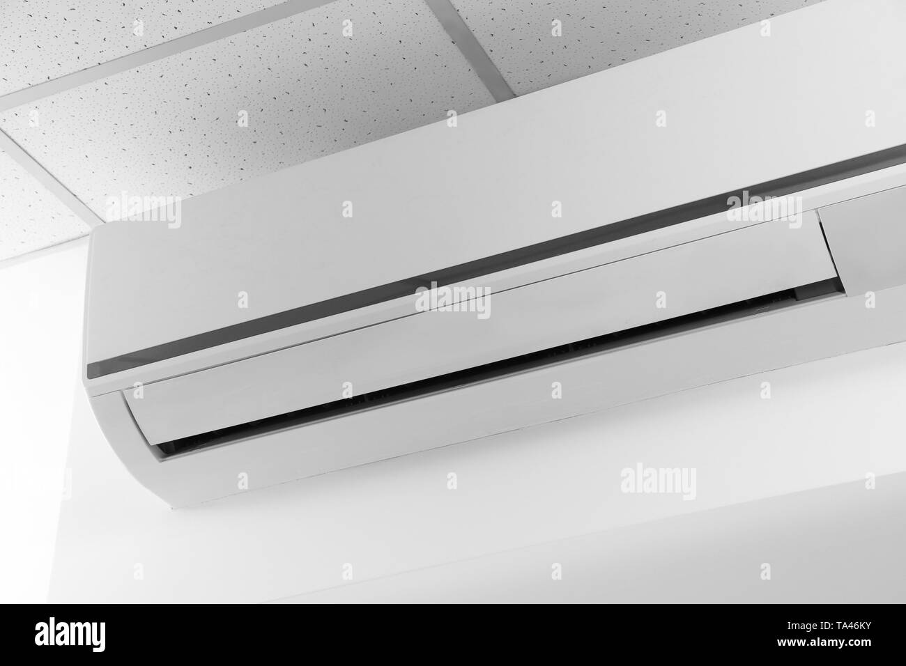 Modern air conditioner on wall Stock Photo - Alamy