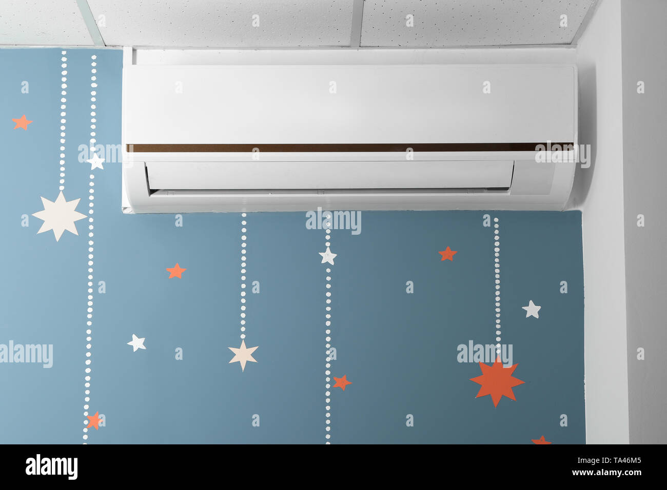 Modern air conditioner on wall Stock Photo - Alamy