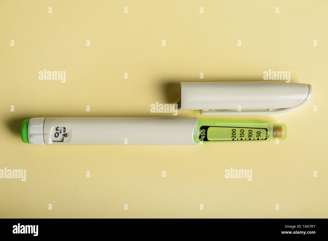 Insulin syringe on color background Stock Photo - Alamy