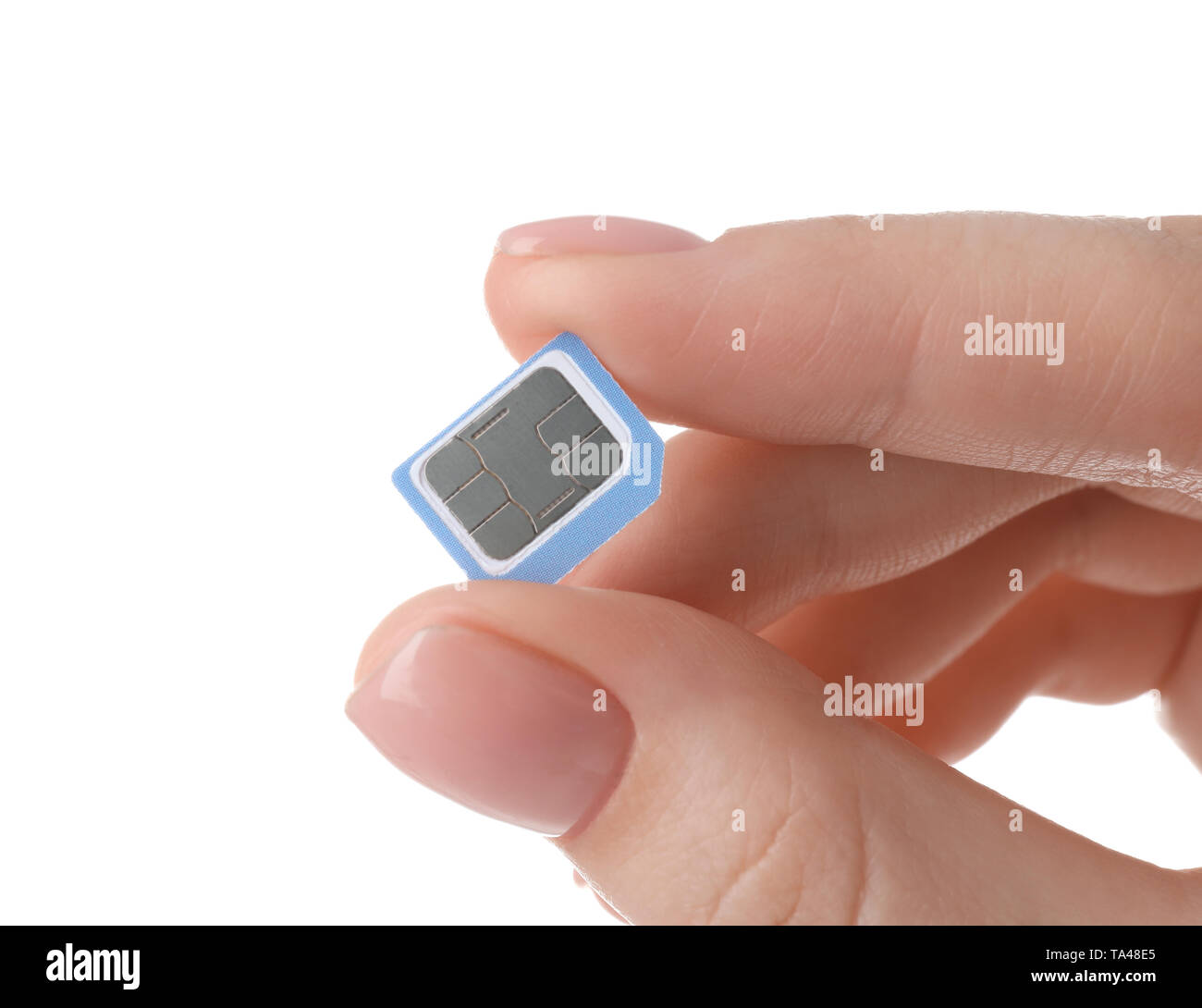 Female hand holding sim card on white background Stock Photo - Alamy