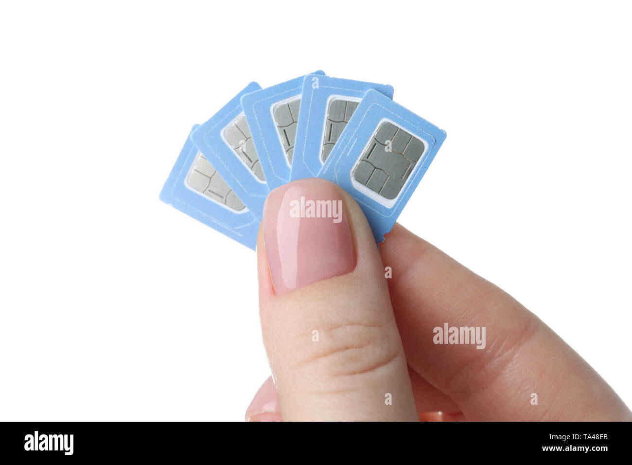Female hand holding sim cards on white background Stock Photo - Alamy