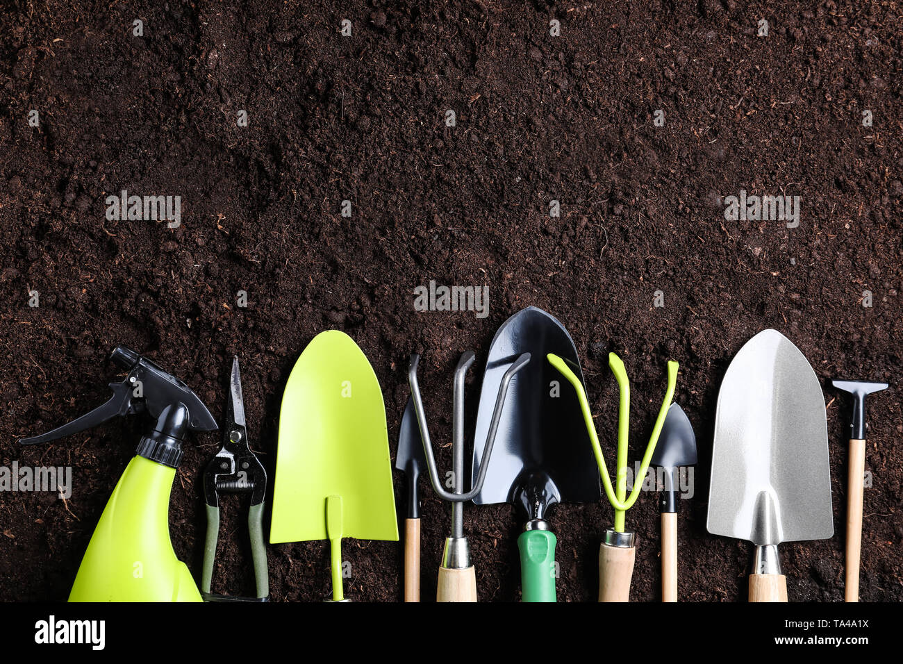Set of gardening tools on soil Stock Photo - Alamy
