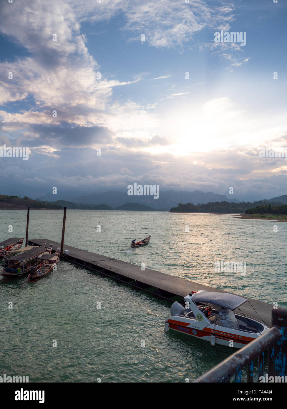 Scenic landscape of big river and reservoir dam with mountain and ...