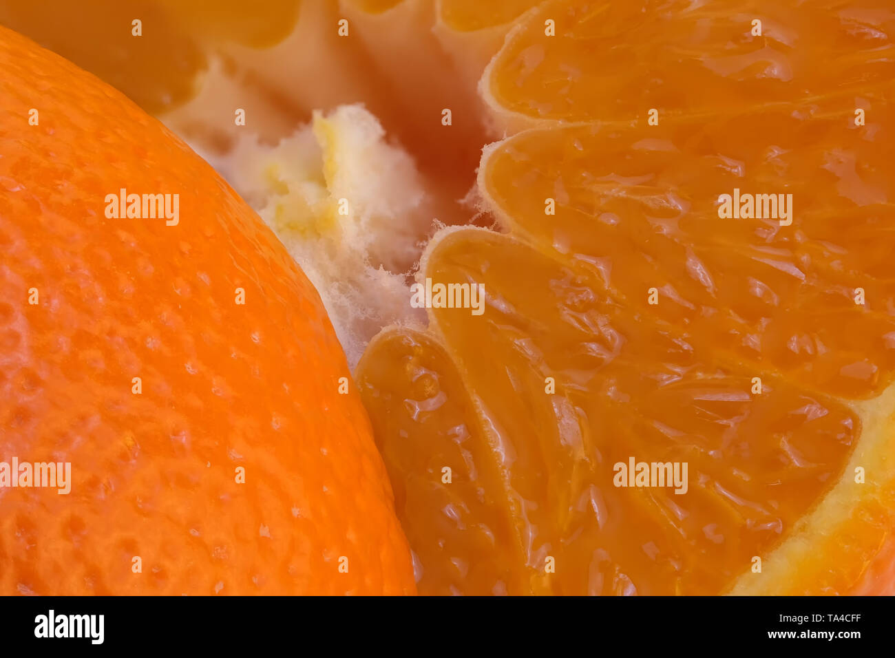 Sliced mandarin close-up full frame macro photo with great depth of ...