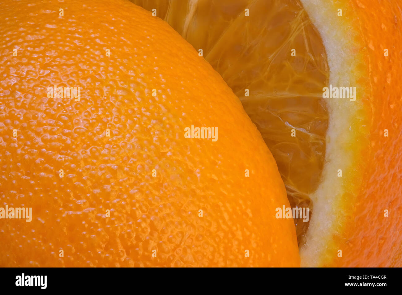 Sliced orange close-up full frame macro photo with great depth of field ...