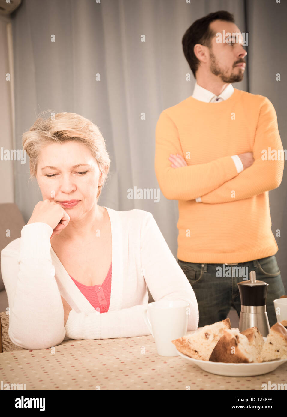 Aged mother arguing with her adult son at home Stock Photo - Alamy