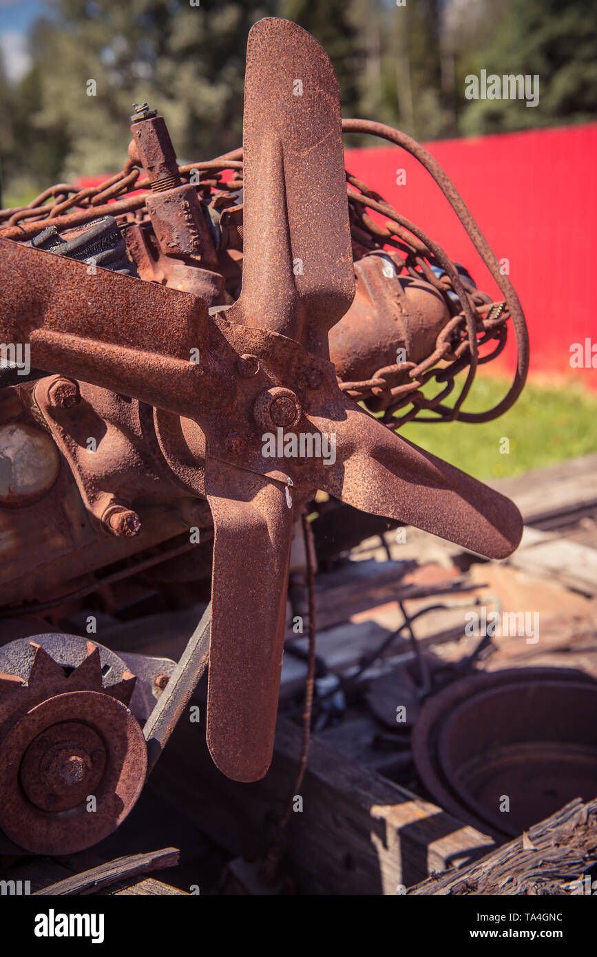 A rusty dead engine discarded in the sun Stock Photo - Alamy
