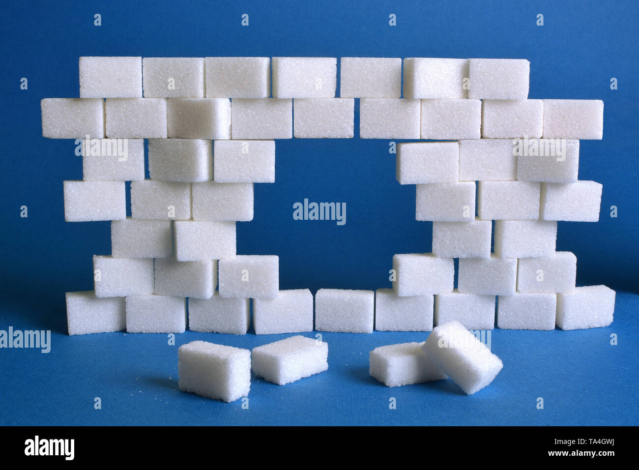 Composition of sugar cubes in the shape of a brick wall Stock Photo - Alamy