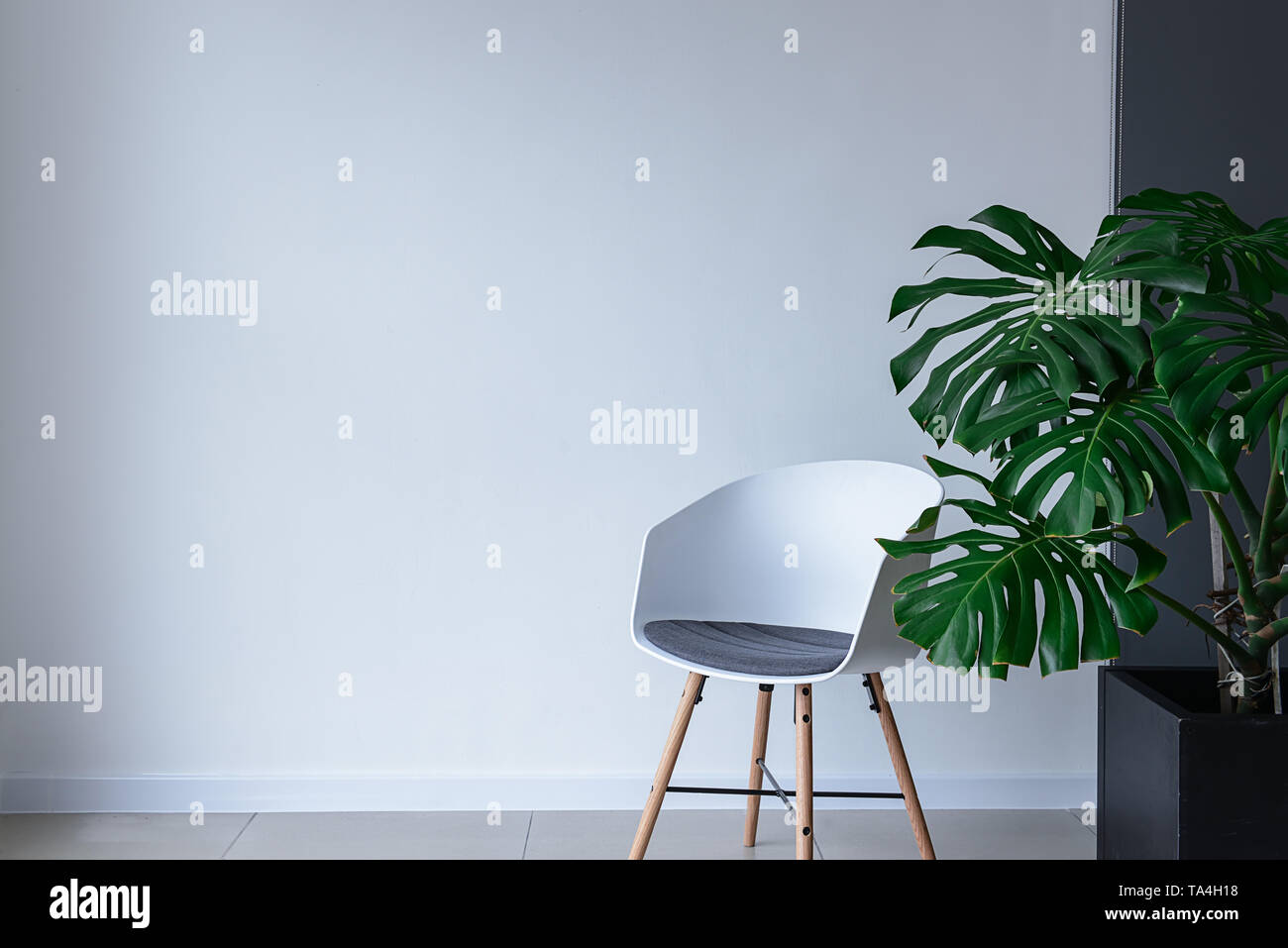 Modern chair near light hi-res stock photography and images - Alamy