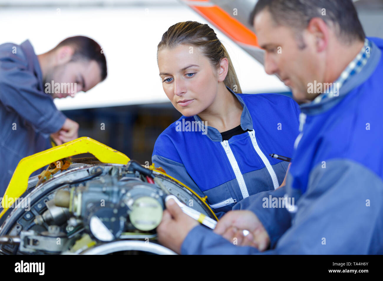 engine assembling team Stock Photo - Alamy