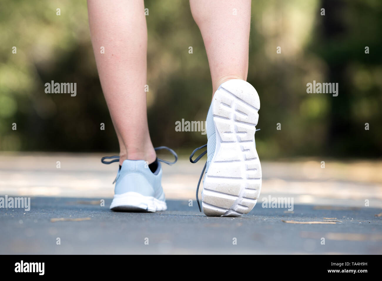 Rear view legs fit muscular hi-res stock photography and images - Alamy