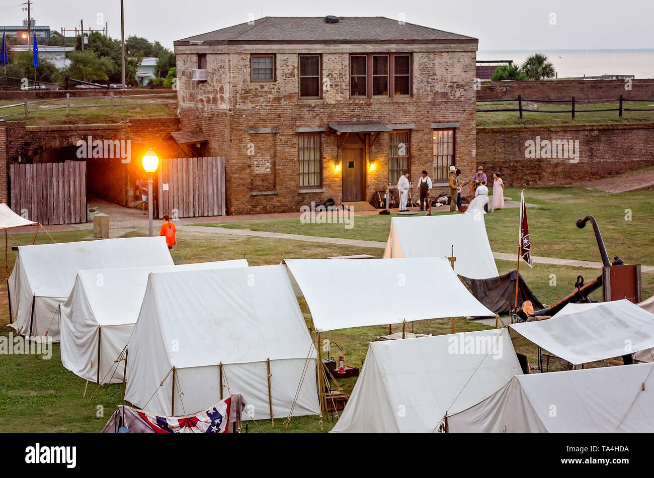 Civil War reenactors camp at Fort Gaines during a reenactment of the ...