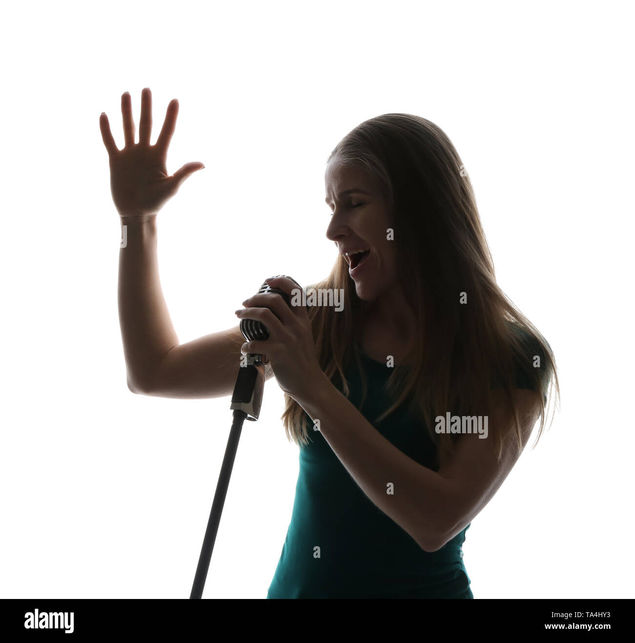 Portrait of female singer on white background Stock Photo - Alamy
