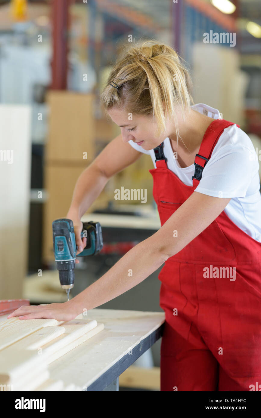 Serious young female carpenter hi-res stock photography and images - Alamy