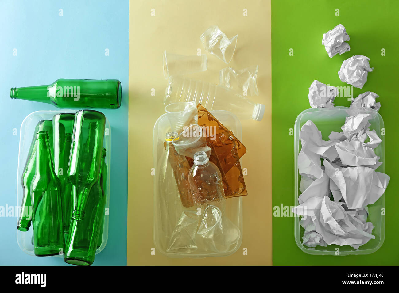 Different sorted trash on color background. Recycle concept Stock Photo ...