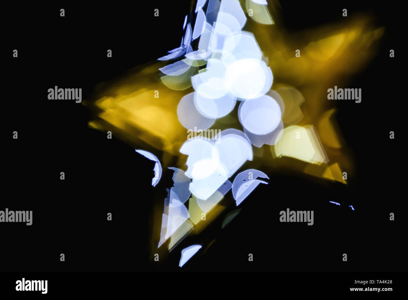 Shape of star with blurred glowing lights Stock Photo - Alamy