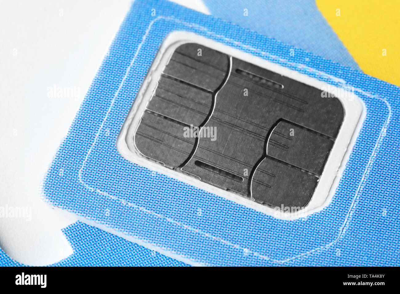 Sim card on white background, closeup Stock Photo - Alamy