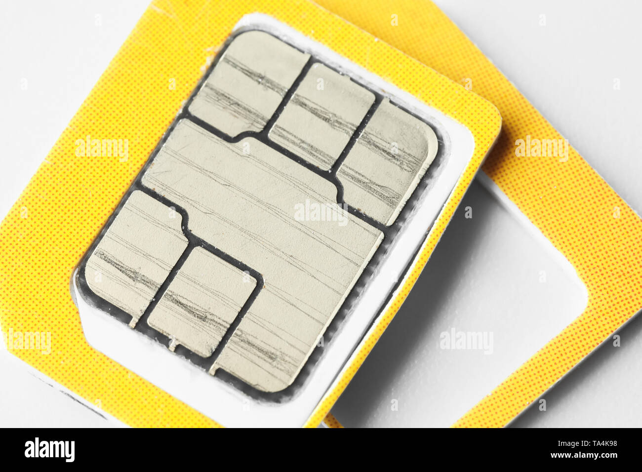 Sim card on white background Stock Photo - Alamy