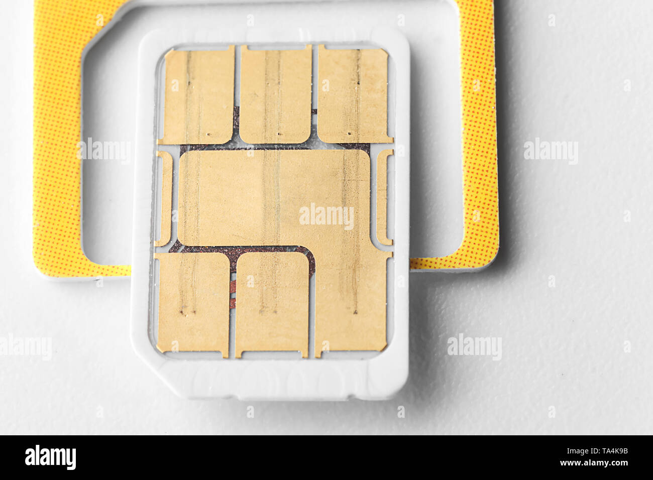 Sim card on white background Stock Photo - Alamy