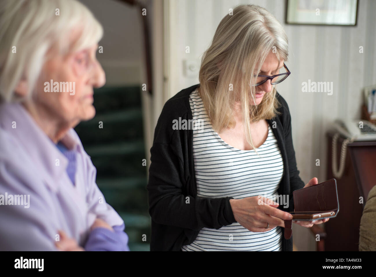 Mature woman says goodbye hi-res stock photography and images - Alamy