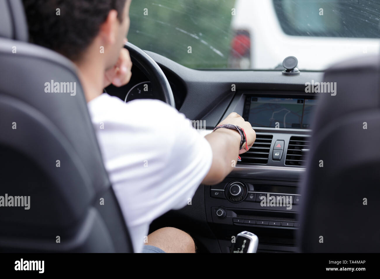 man using gps navigation system in car to travel Stock Photo - Alamy
