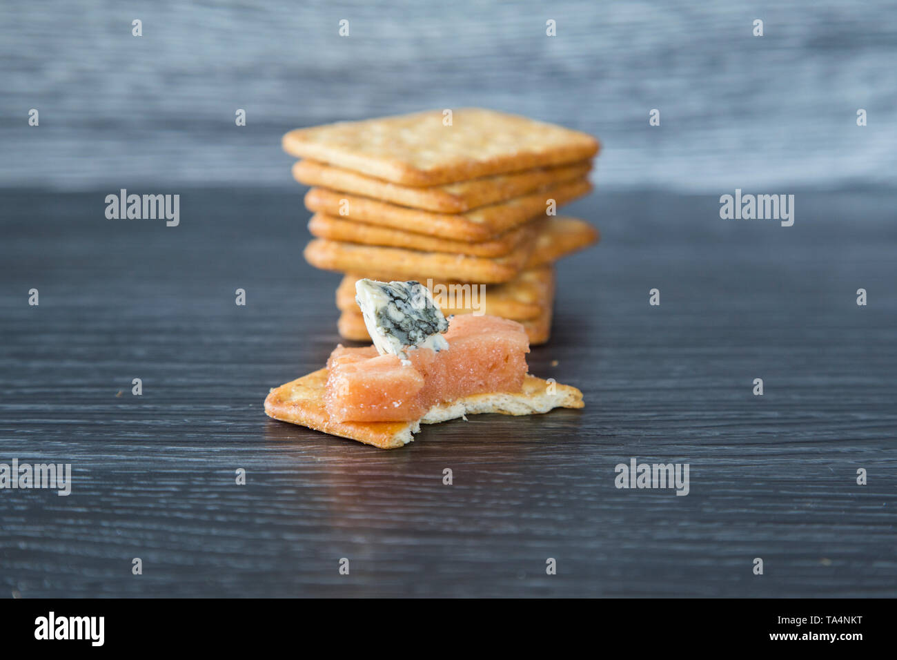 Delicious homemade quince paste served with creamy blue vein cheese and ...