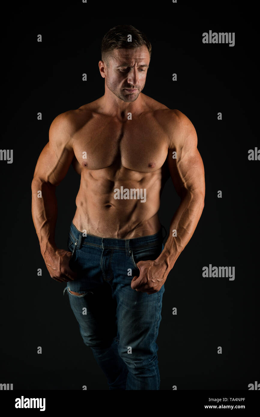 Macho handsome with muscular torso. Attractive guy muscular body. Proud ...