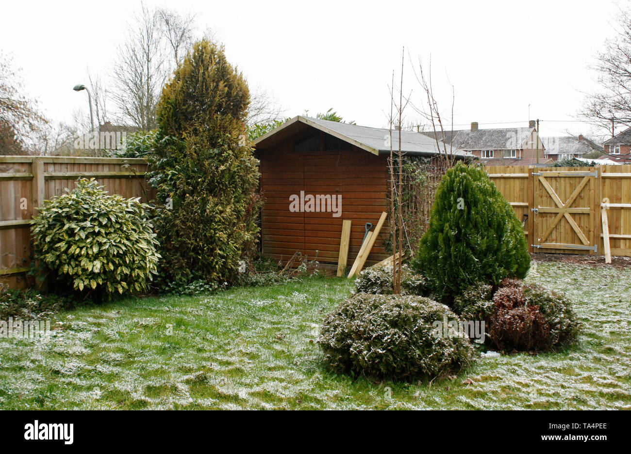A garage in backyard of a house in UK Stock Photo - Alamy