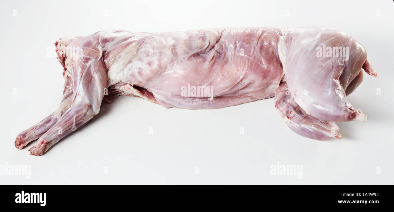 Uncooked cleaned and skinned wild rabbit ready for preparing a ...