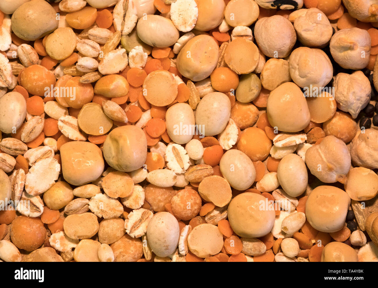 Mixed dry peas and seeds background Stock Photo - Alamy