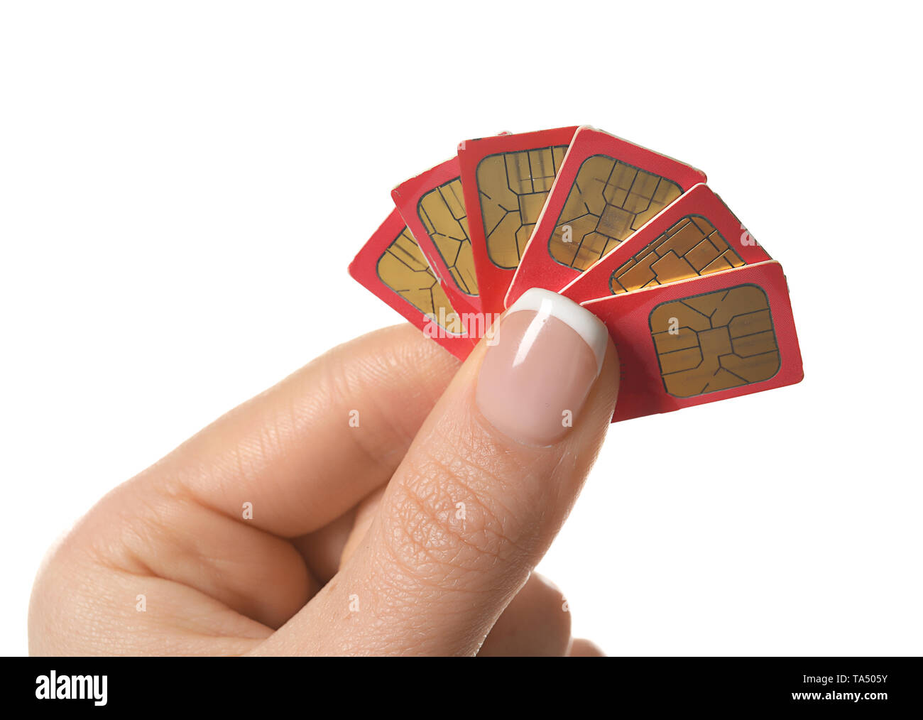Female hand holding sim cards on white background Stock Photo - Alamy