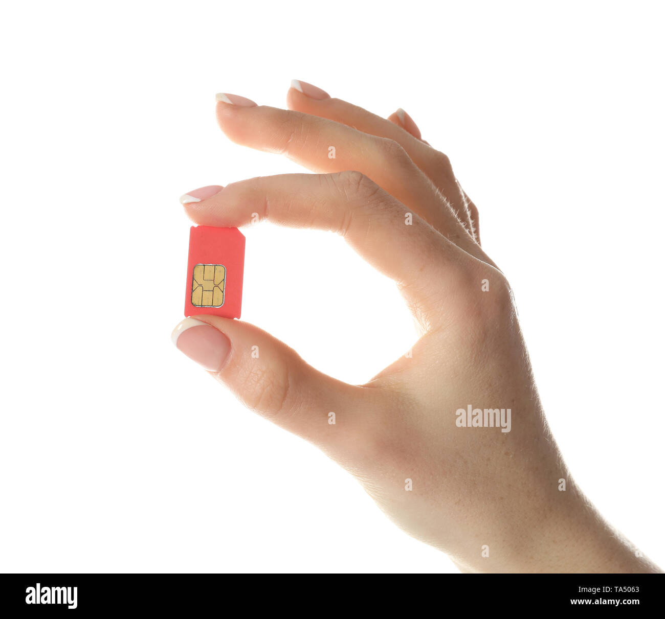 Female hand holding sim card on white background Stock Photo - Alamy