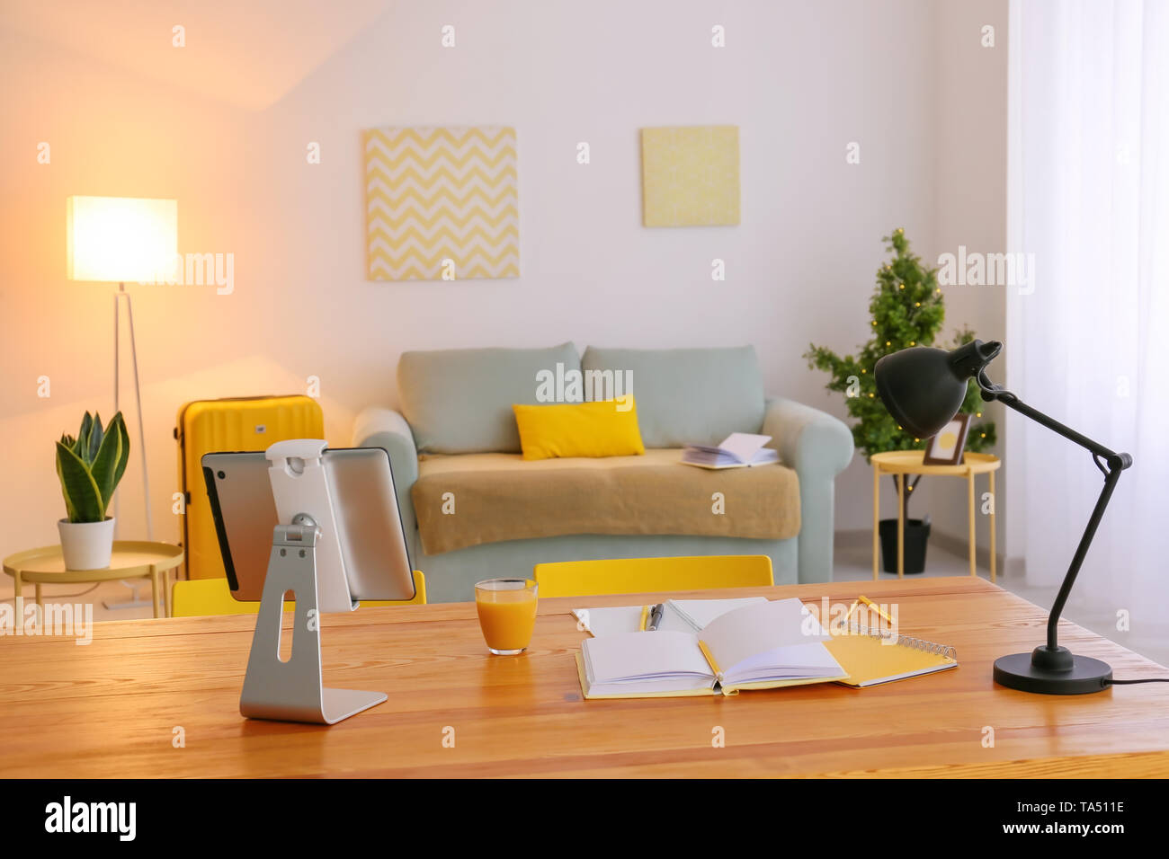 Comfortable workplace in modern room Stock Photo - Alamy