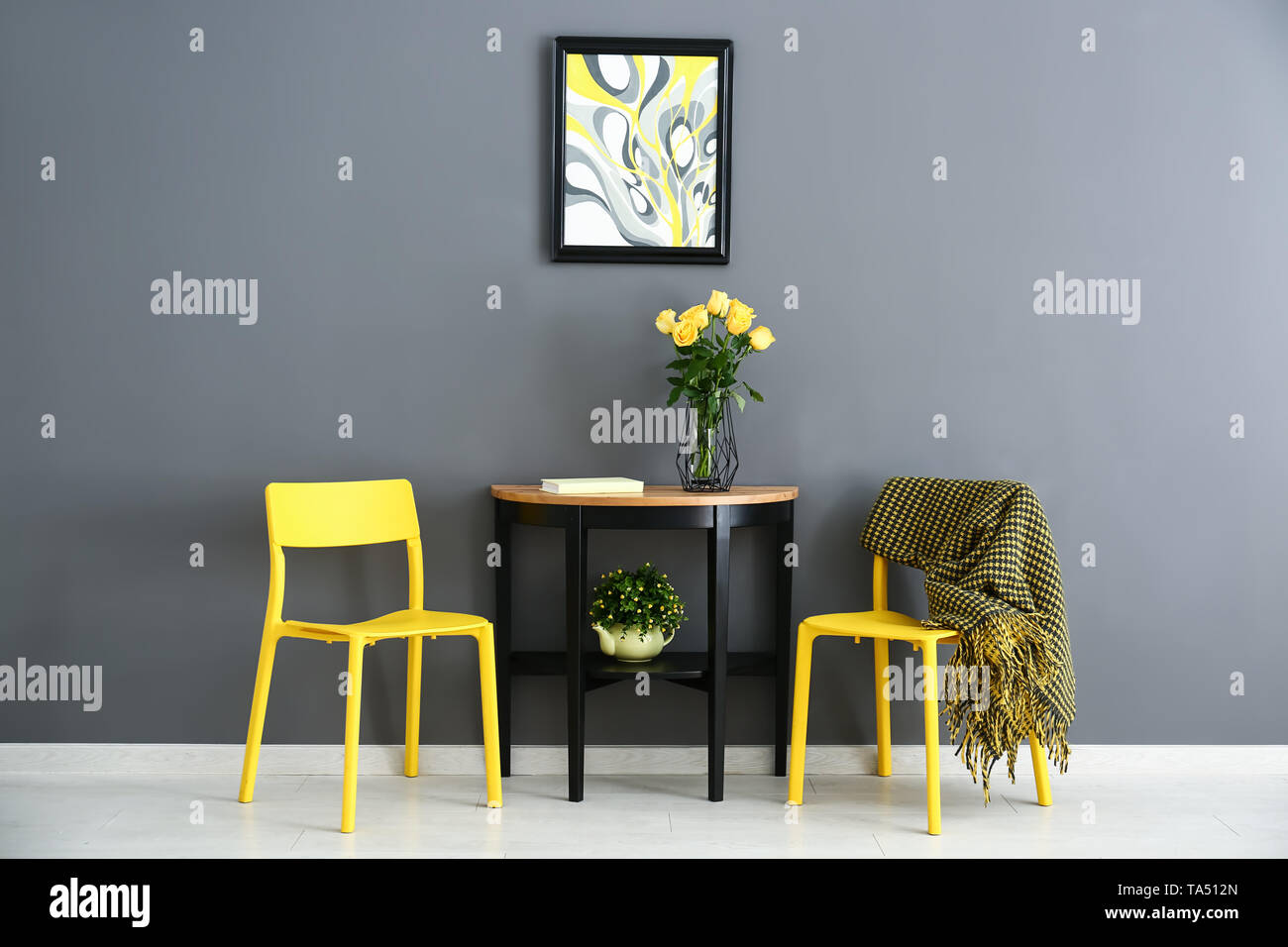 Interior of modern living room with comfortable table and chairs Stock ...