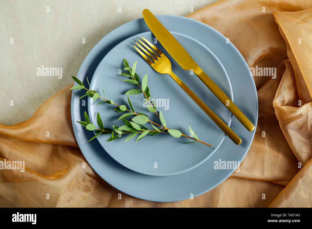 Simple table setting in restaurant Stock Photo - Alamy