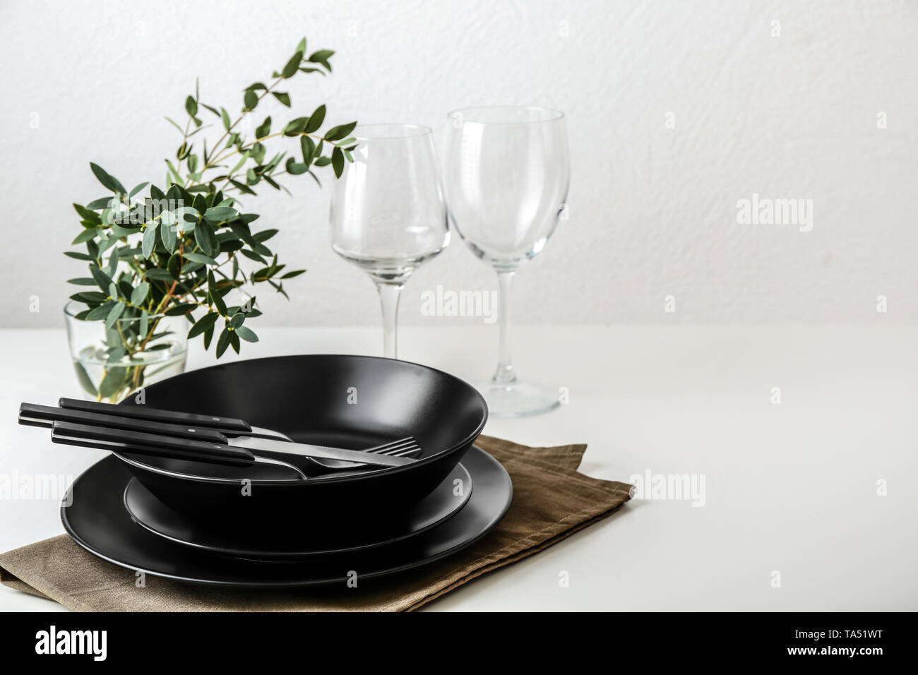 Beautiful table setting on white background Stock Photo - Alamy
