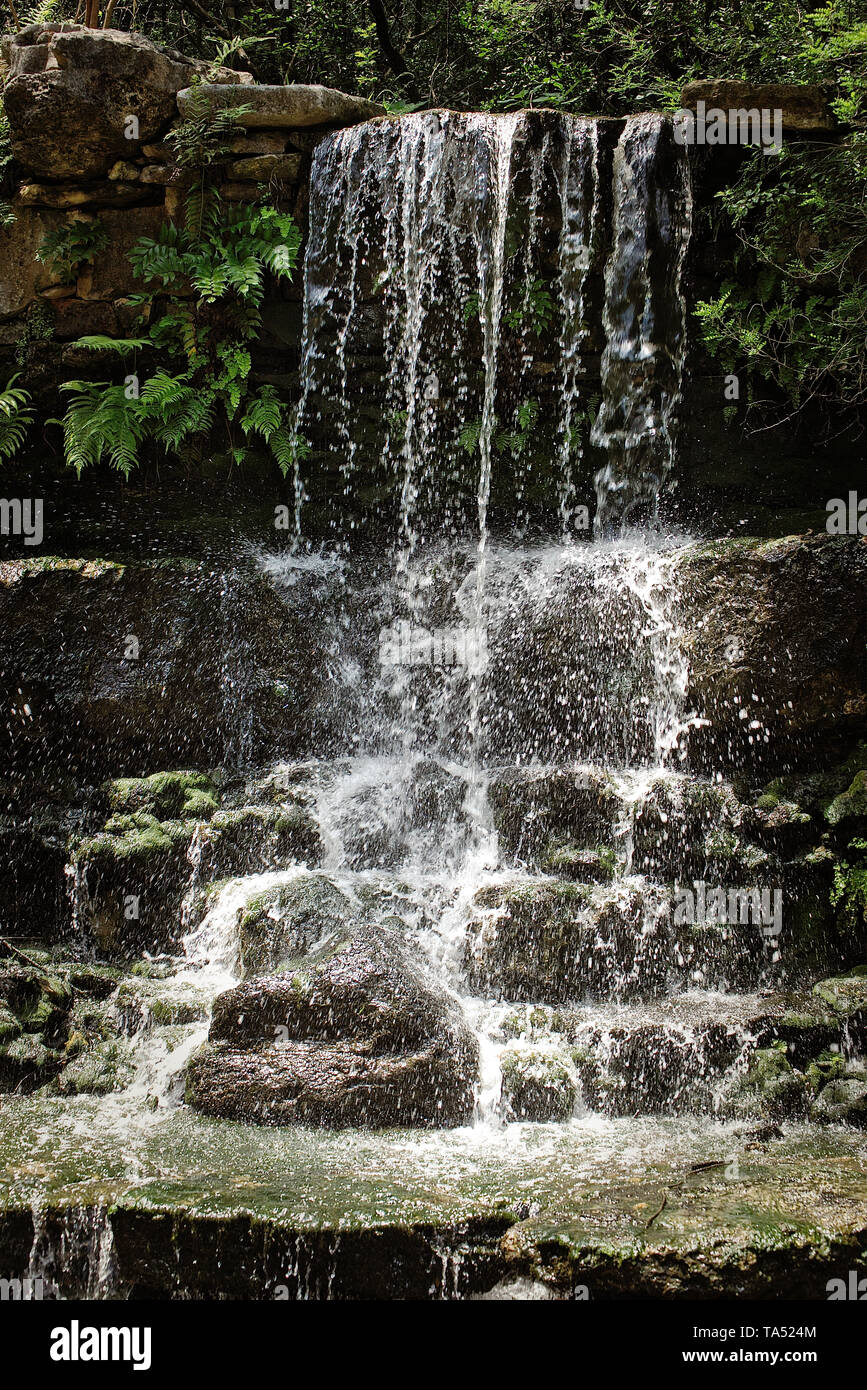 Water splashing on the rocks of a stair step terrace Stock Photo - Alamy