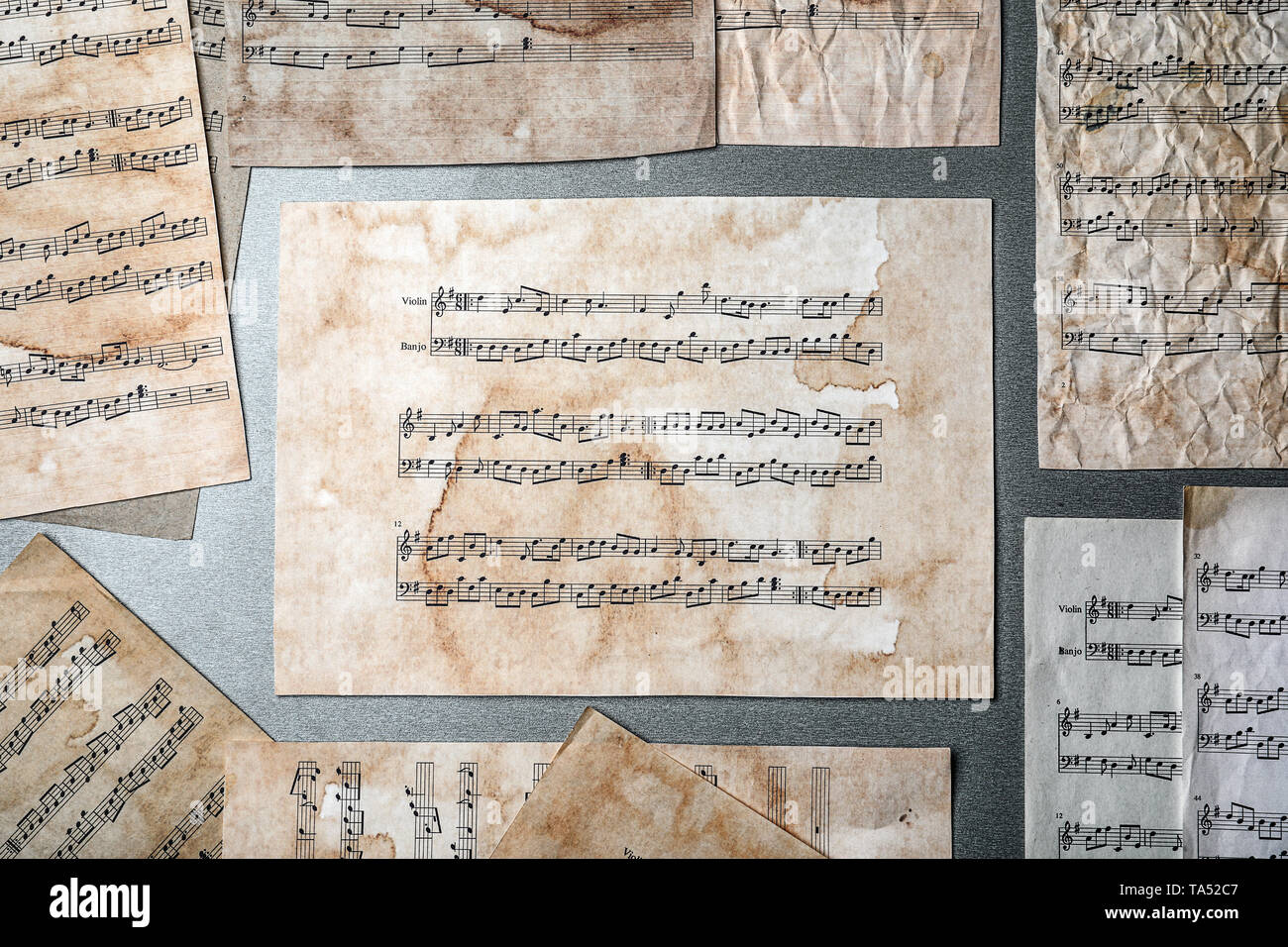 Old music sheets on table Stock Photo - Alamy