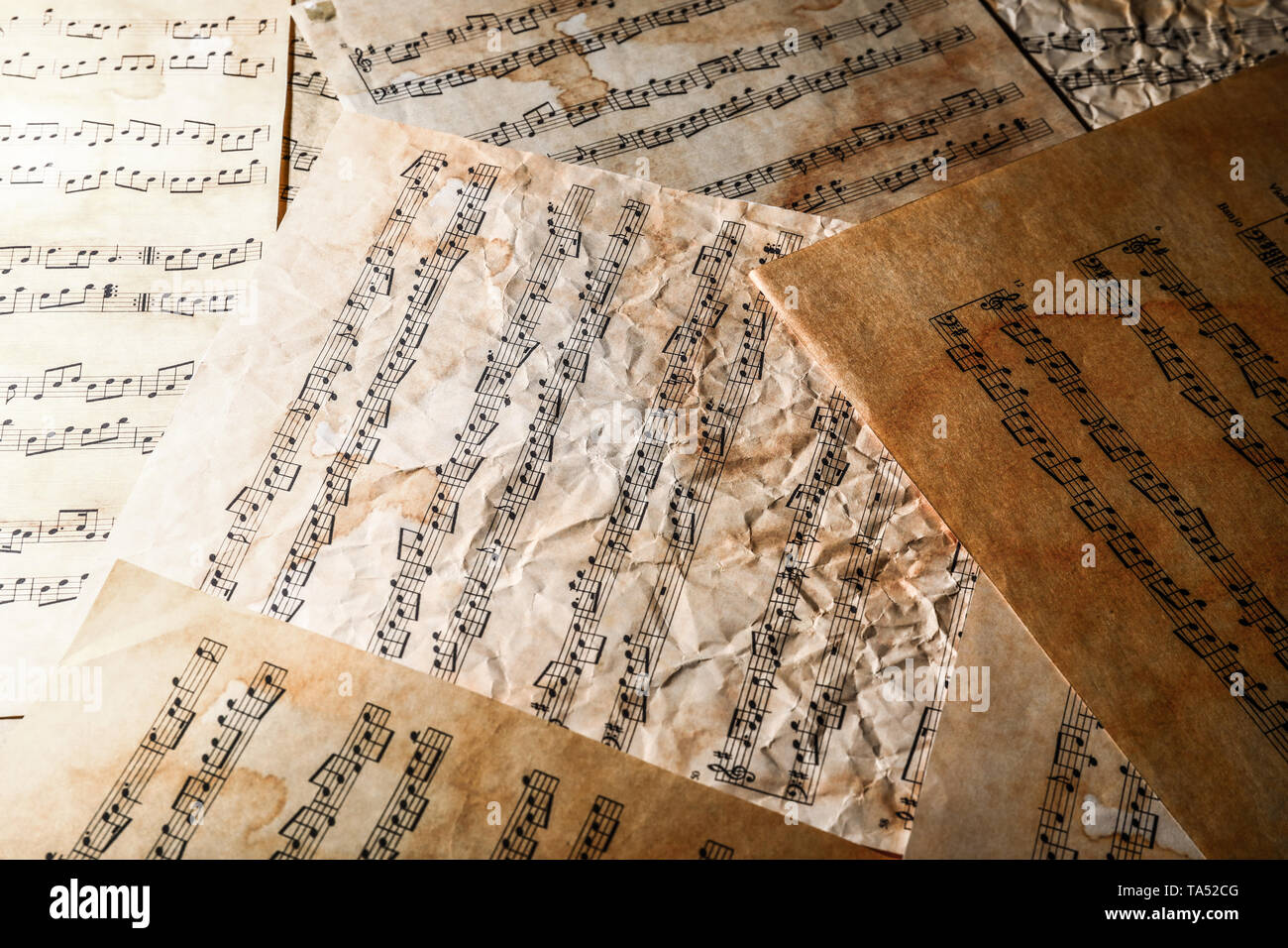 Old music sheets on table Stock Photo - Alamy