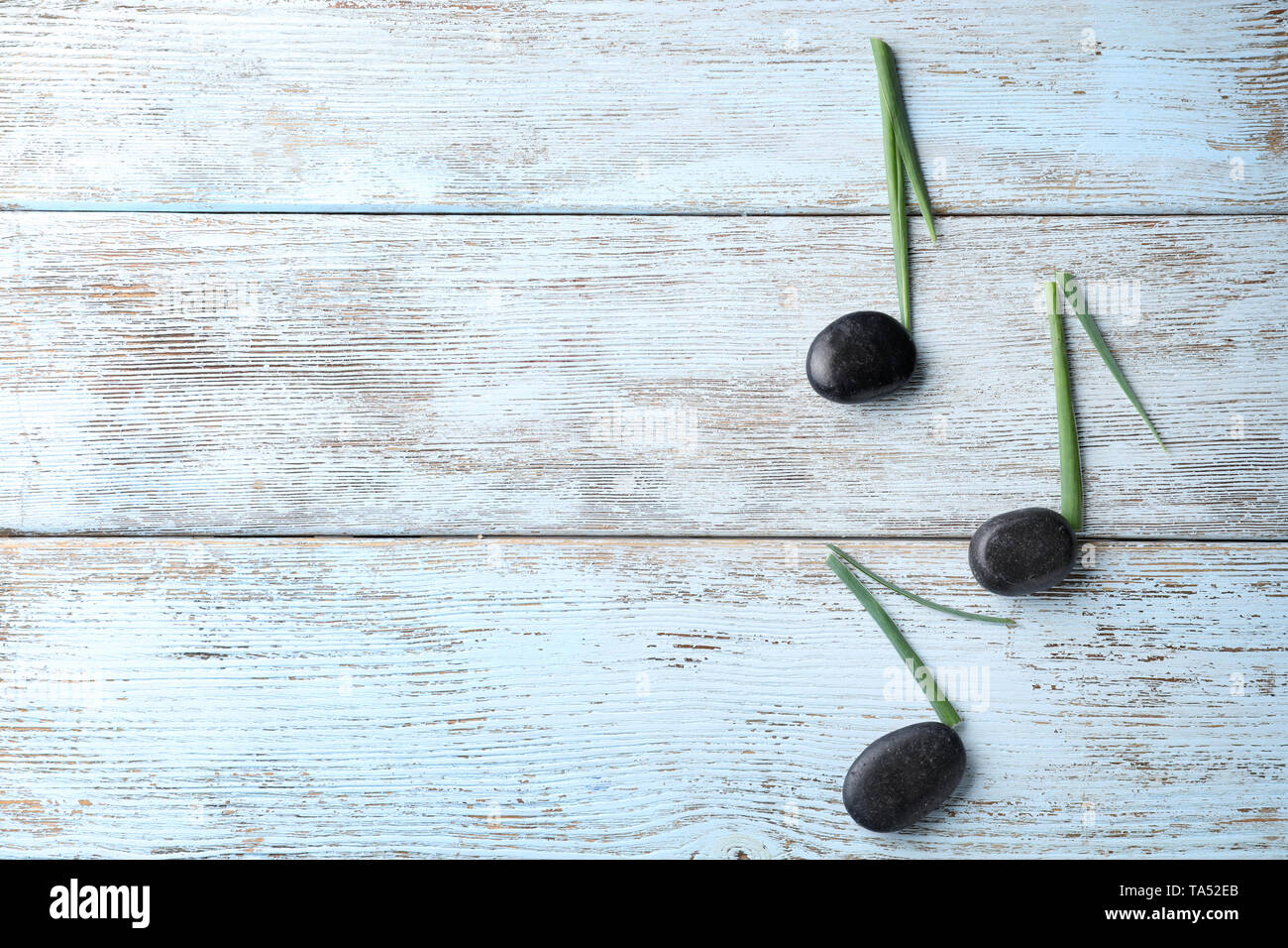 Music notes made of natural materials on wooden background Stock Photo ...