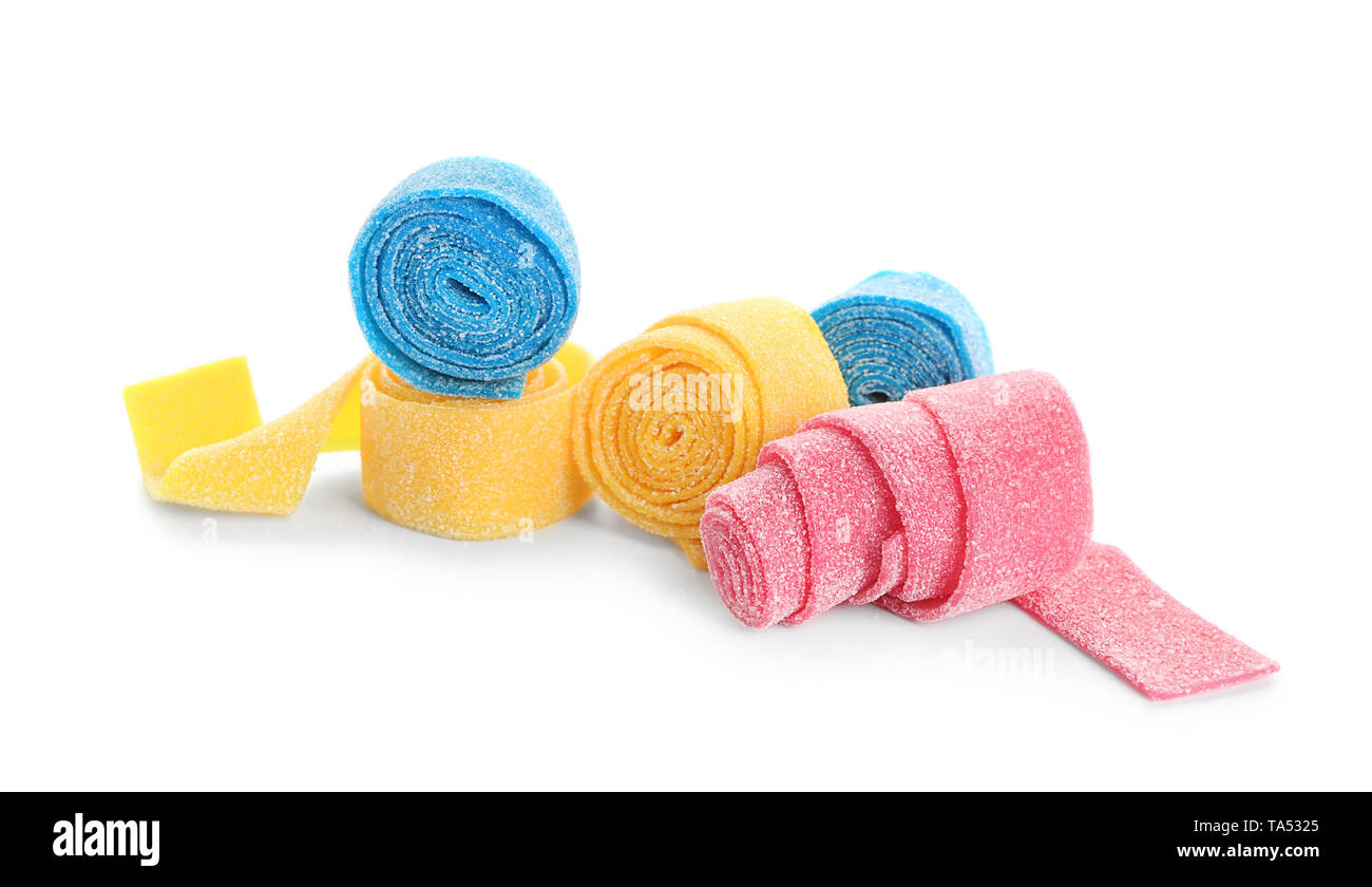 Sweet candy rolls on white background Stock Photo - Alamy
