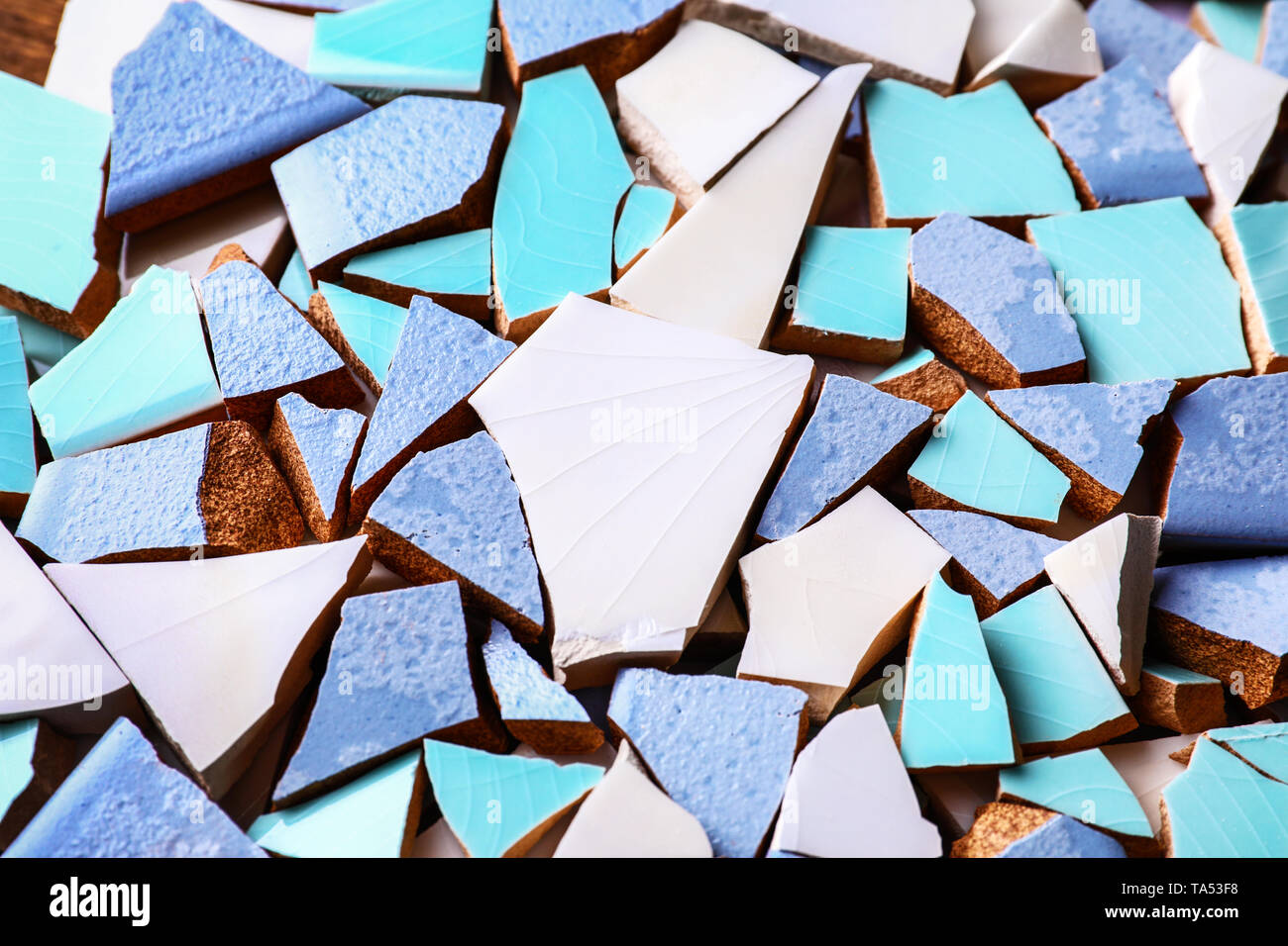 Pieces of broken tiles Stock Photo - Alamy