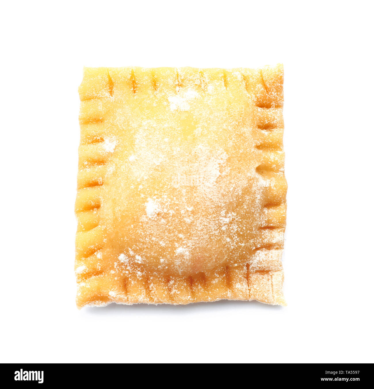 Uncooked ravioli on white background Stock Photo - Alamy